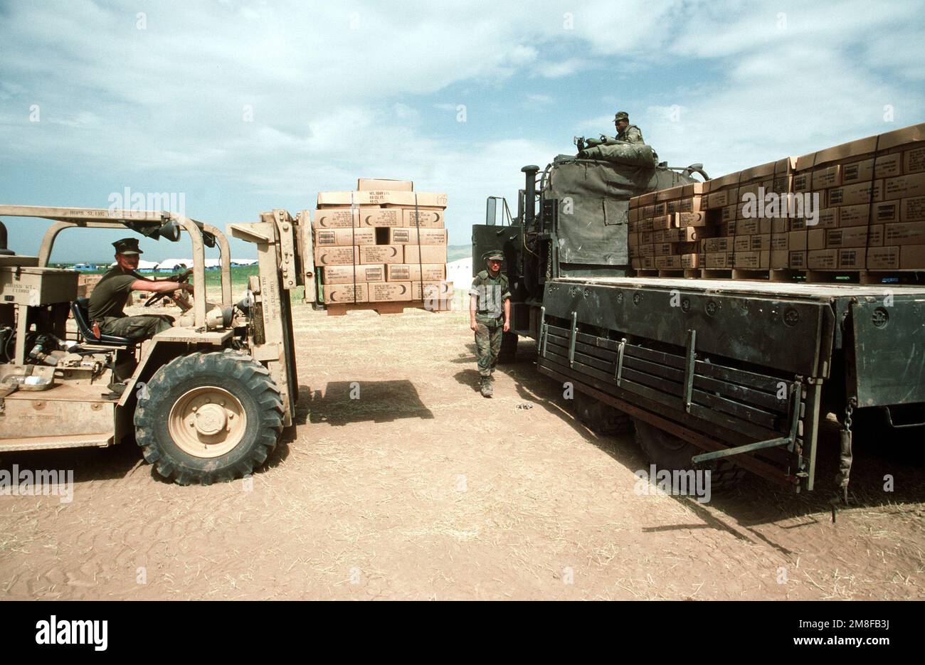 CPL Lee O. Hughes, 2nd Battalion, 8th Marines, operates a forklift to ...