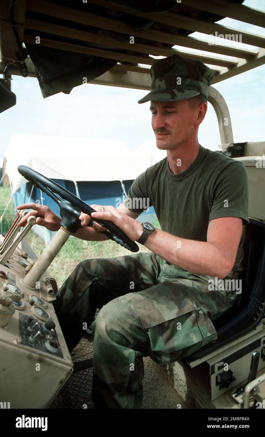 CPL Lee O. Hughes, 2nd Battalion, 8th Marines, operates a forklift to ...