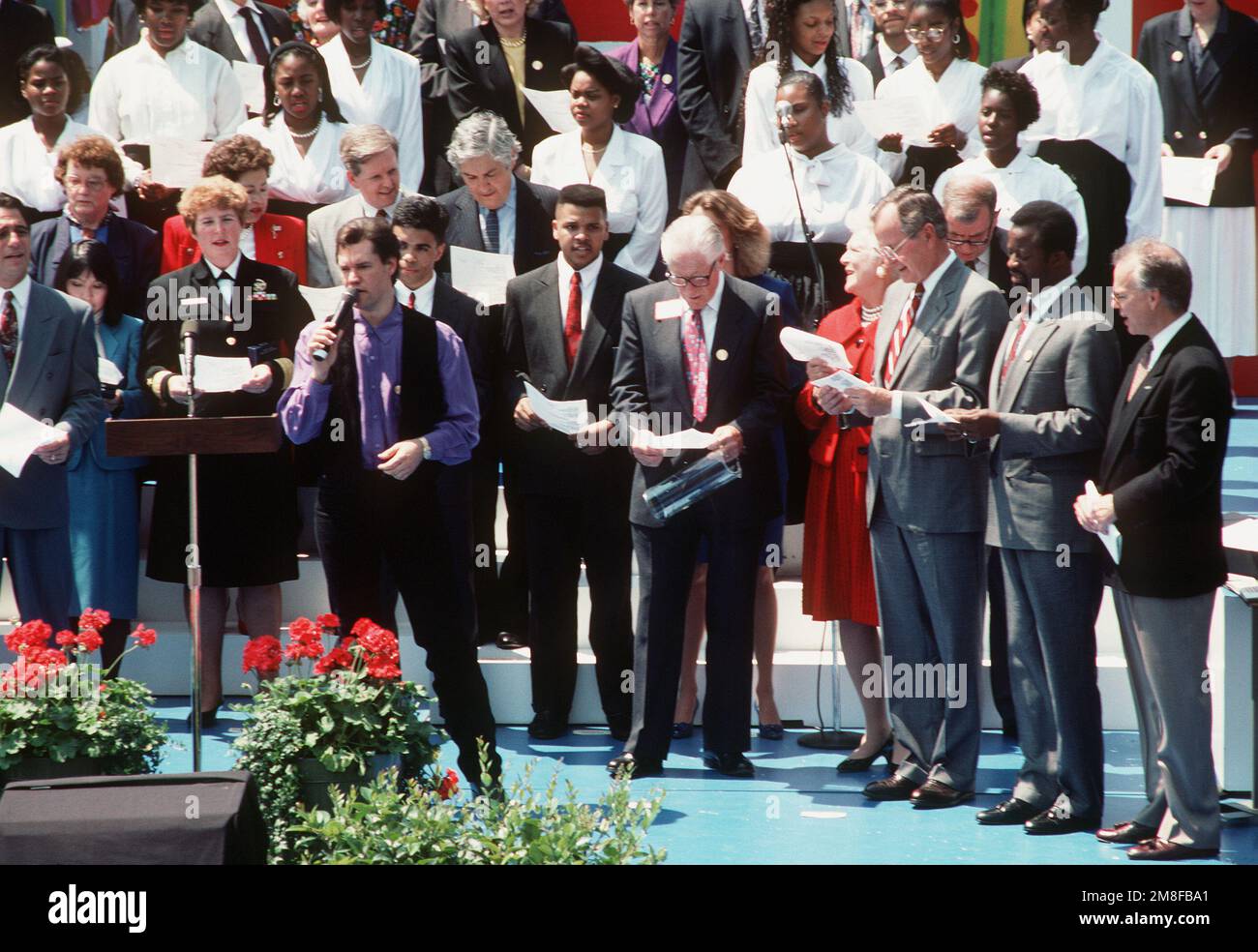 Singer Randy Travis entertains during a ceremony honoring Presidential ...