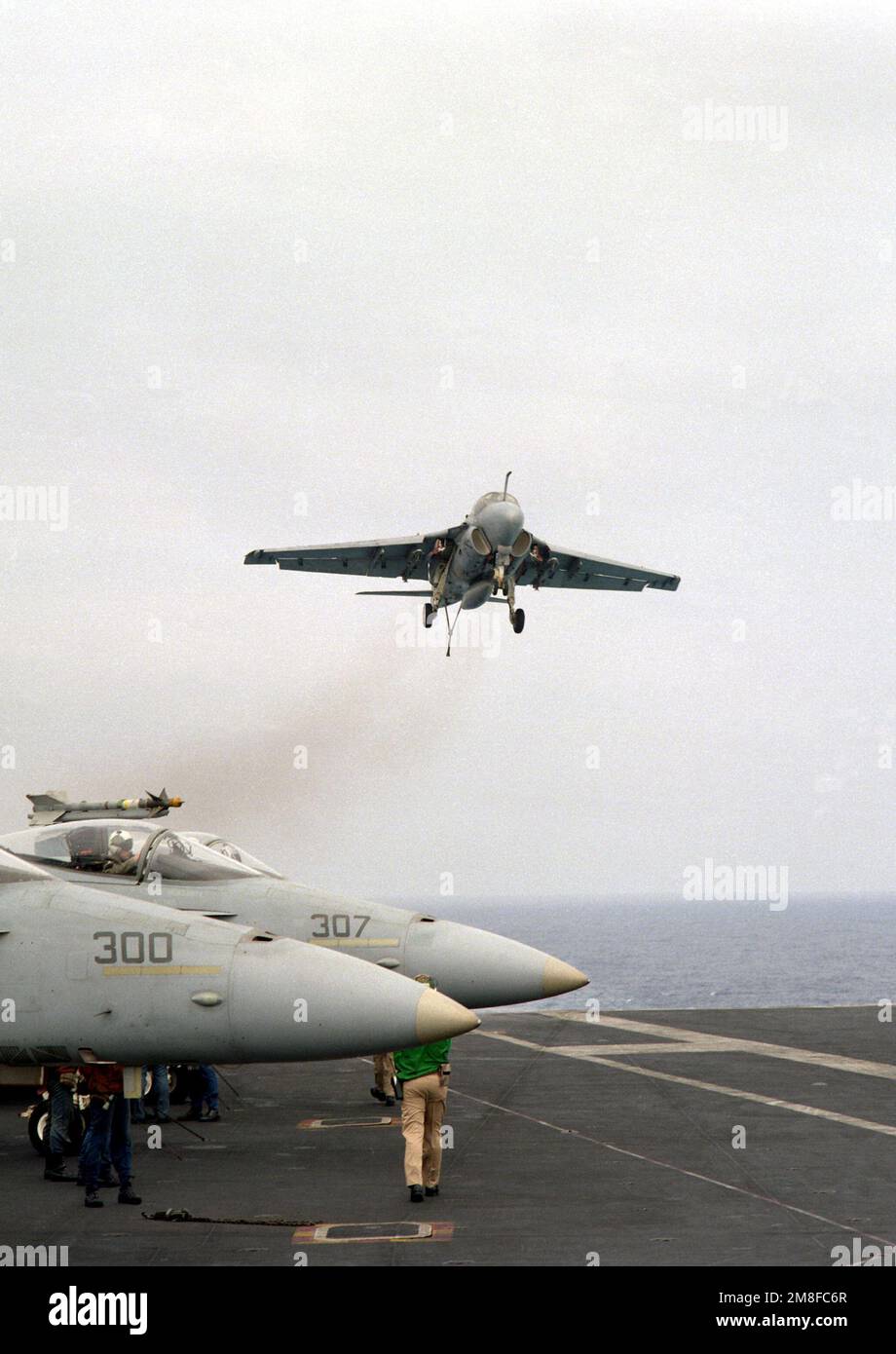 An Attack Squadron 36 (VA-36) A-6E Intruder aircraft comes in for an ...