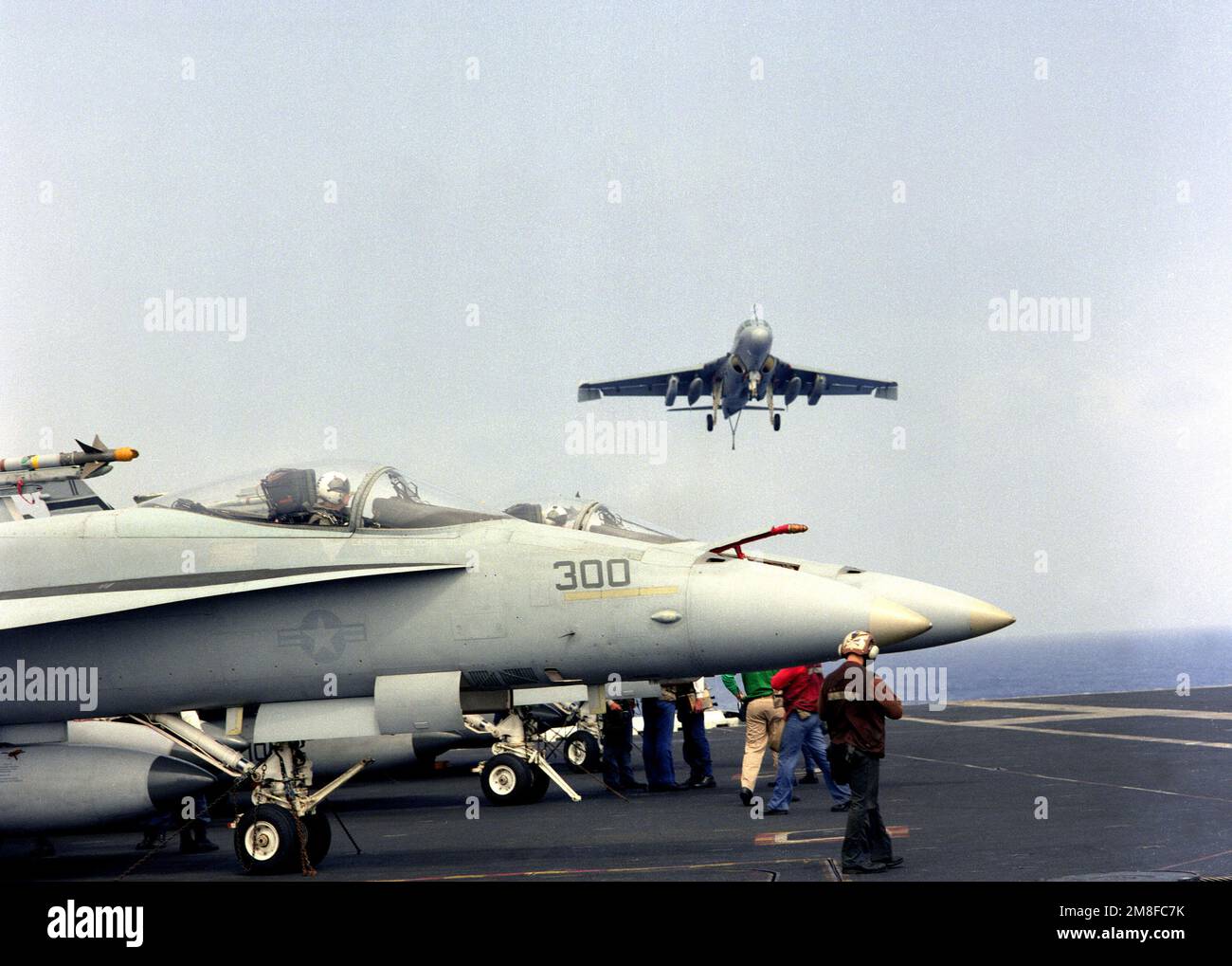 The pilot of a Strike Fighter Squadron 15 (VFA-15) F/A-18A Hornet ...