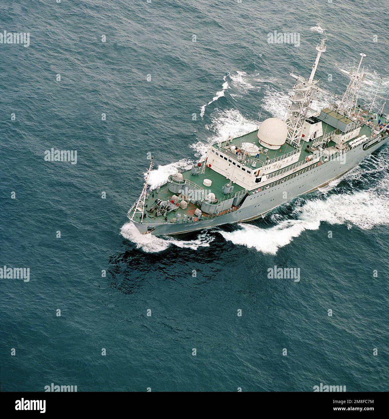 An aerial port bow view of the Soviet Vishnya class intelligence ...