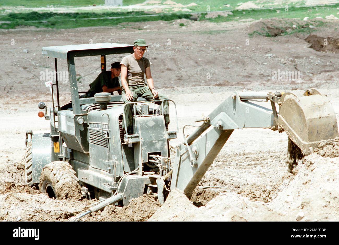 A Seabee from Naval Mobile Construction Battalion 133 (NMCB-133) use ...
