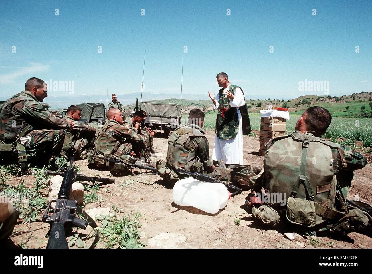 Marines from the 24th Marine Expeditionary Unit (24th MEU) listen as ...