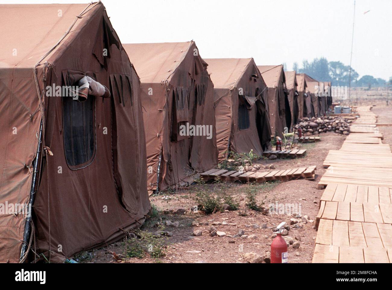 A tent city accommodates deployed U.S. military personnel during the ...