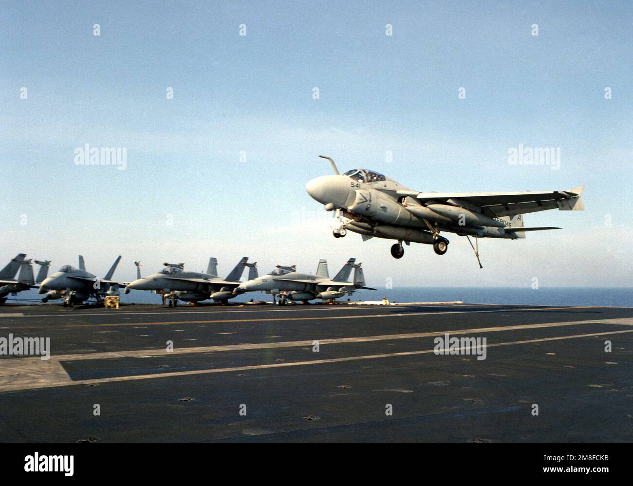 An Attack Squadron 36 (VA-36) A-6E Intruder aircraft comes in for an ...