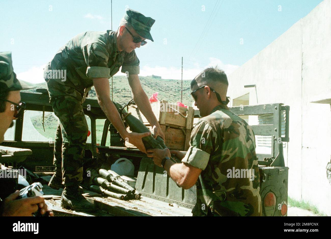 Marines from an explosive ordnance disposal (EOD) team attached to ...