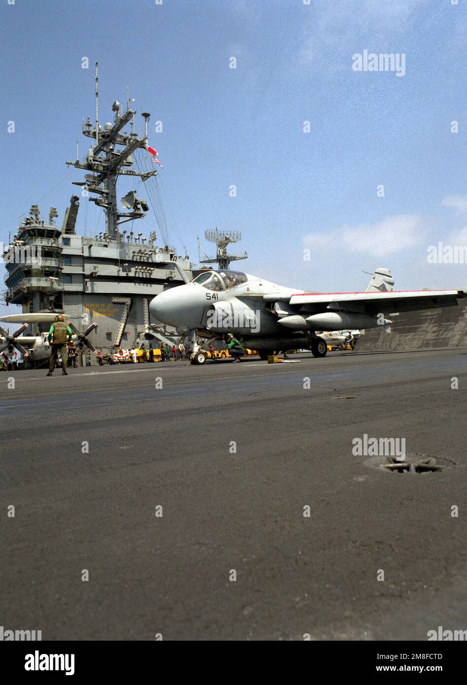 An Attack Squadron 36 (VA-36) A-6E Intruder aircraft stands ready for ...
