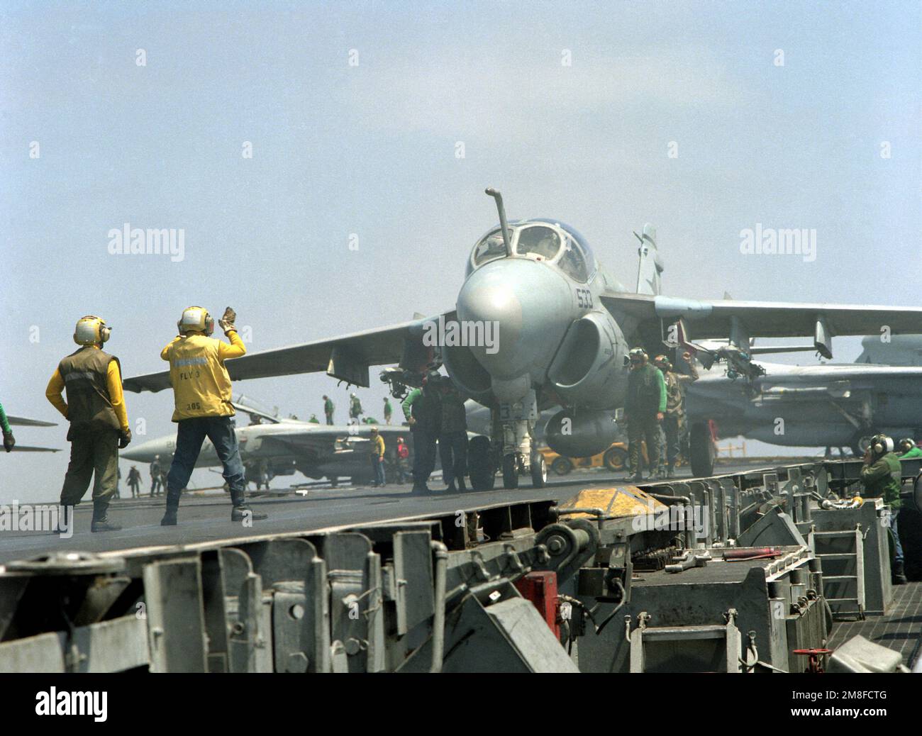 An Attack Squadron 36 (VA-36) A-6E Intruder aircraft is readied for ...