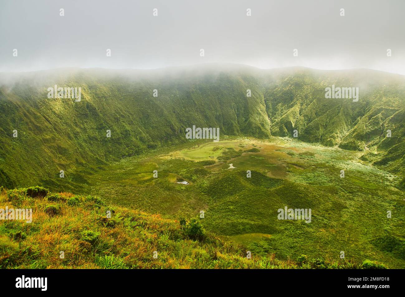 A high-angle view of the crater of the Caldeira volcano located on the ...