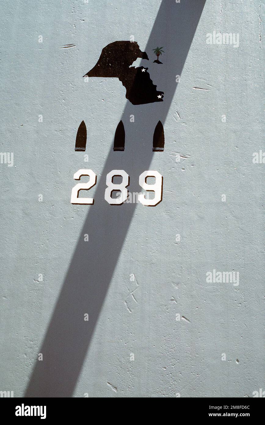 Artillery shells and the country of Kuwait are outlined on the forward ...