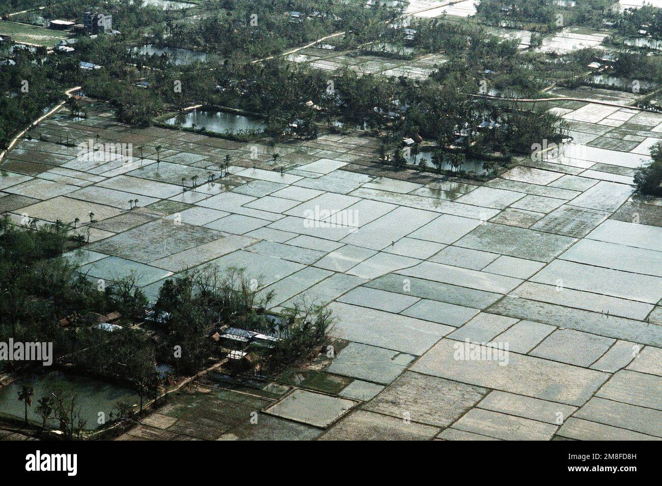 An aerial view of flooded fields in the aftermath of a cyclone which ...