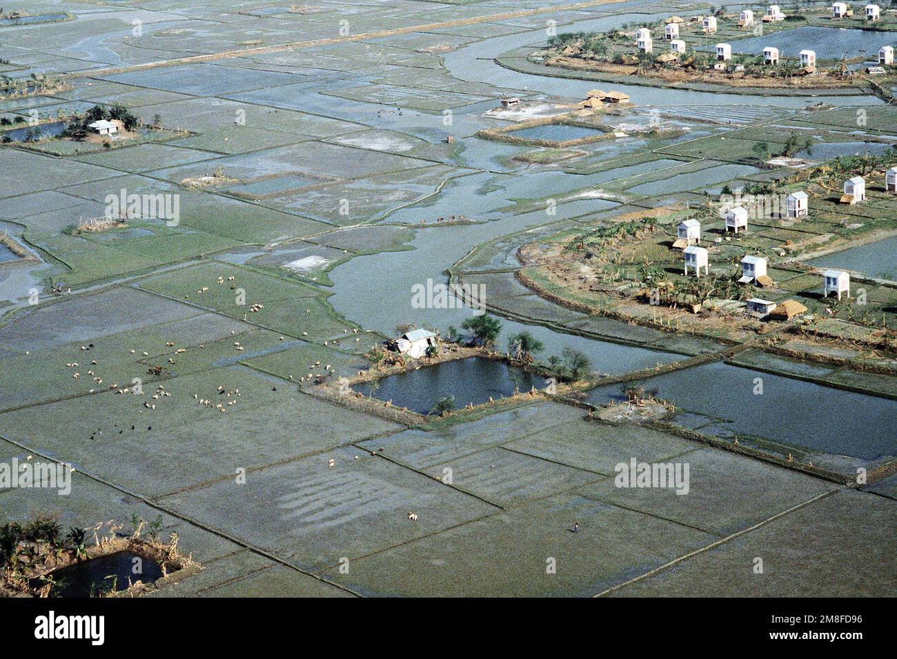 An aerial view of flooded fields in the aftermath of a cyclone which ...