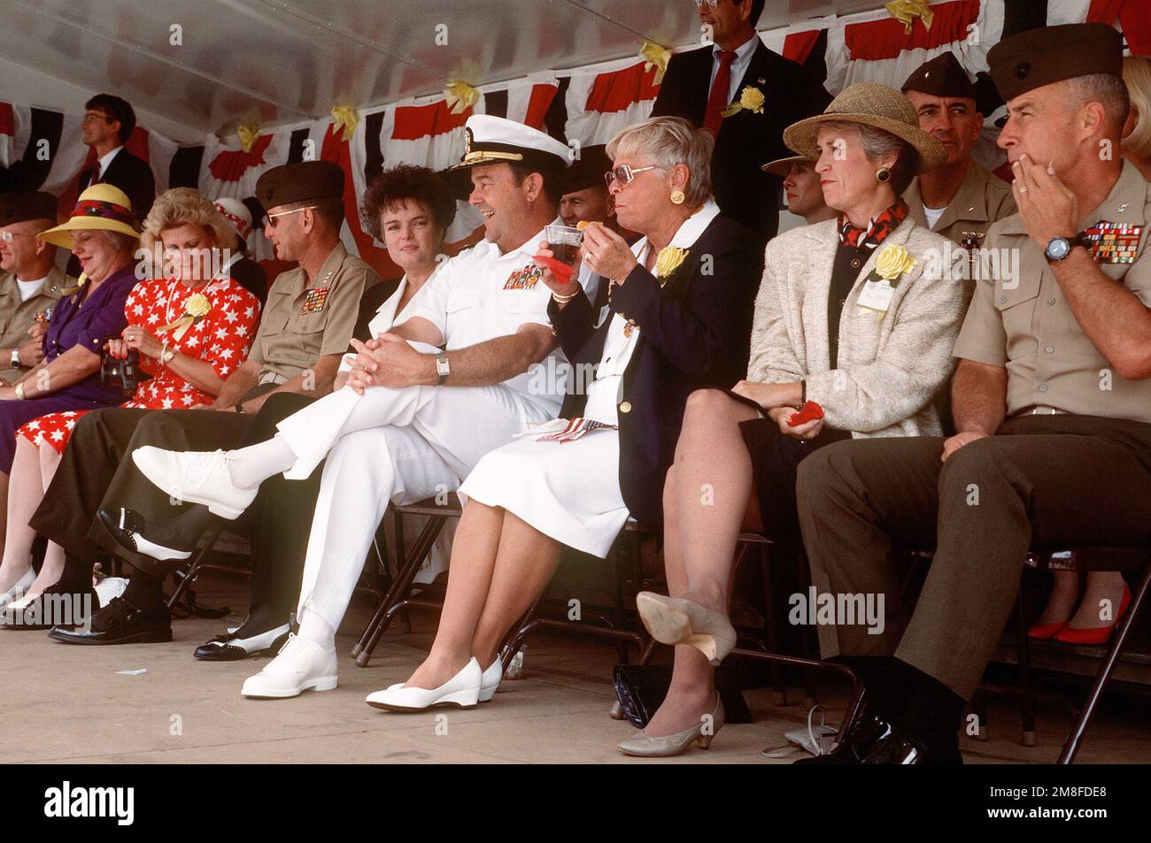 Honored guests watch the "San Diego Salutes the Troops" parade, an ...