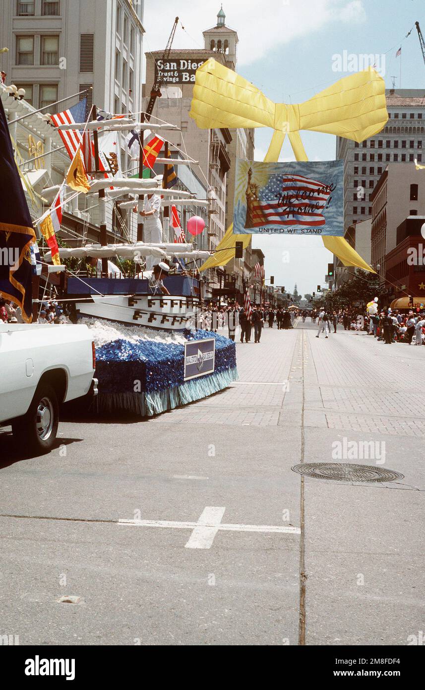 A float from Naval Station, San Diego, Calif., is pulled down Broadway ...
