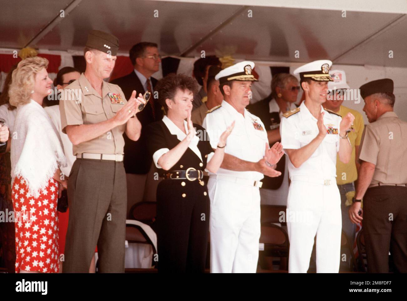 Honored guests applaud during the "San Diego Salutes the Troops" parade ...