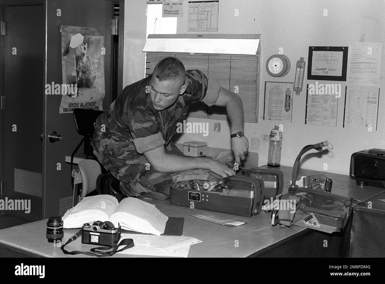 PFC Pedro White packs a seat pan for a plane's ejection seat in the ...