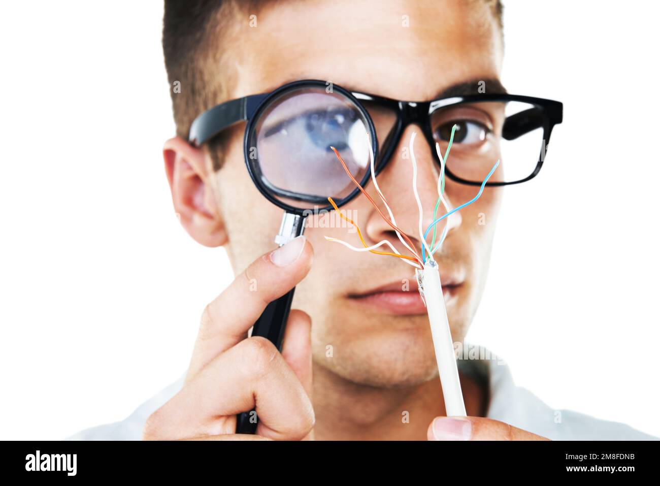 Concentration is key. A close up portrait of a technician observing a ...