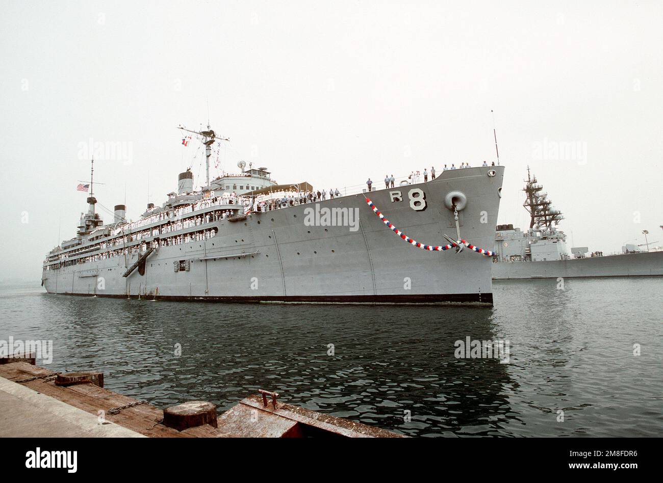 The repair ship USS JASON (AR-8) nears its berth at the pier at it ...