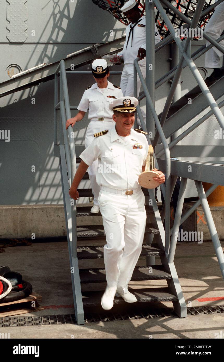 CAPT. R. W. Tobin, commanding officer of the repair ship USS JASON (AR ...