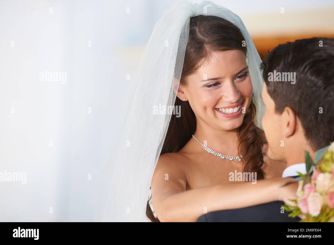 So in love. Intimate image of a newlywed couple basking in their new ...