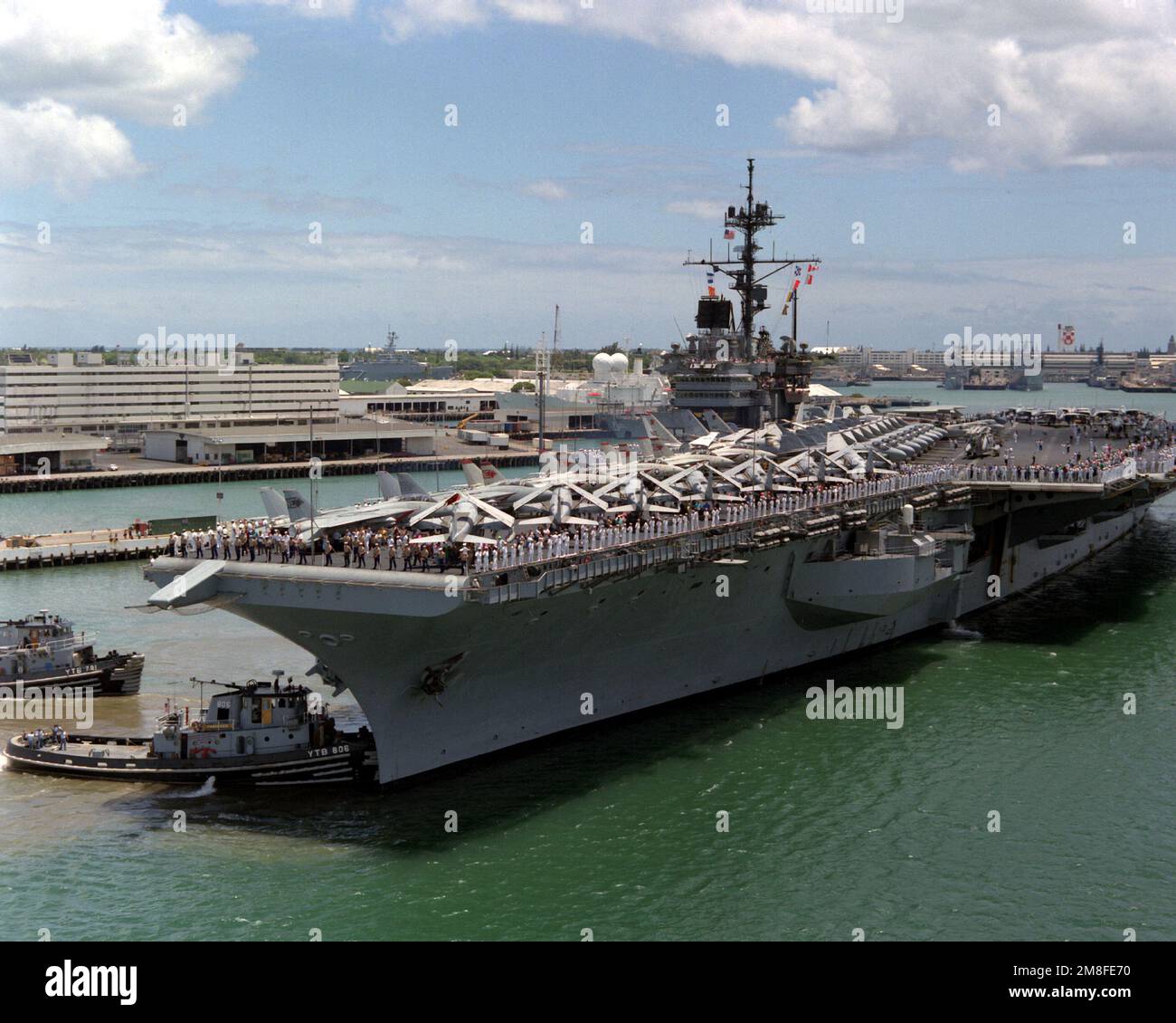 Sailors man the rails aboard the aircraft carrier USS RANGER (CV-61 ...