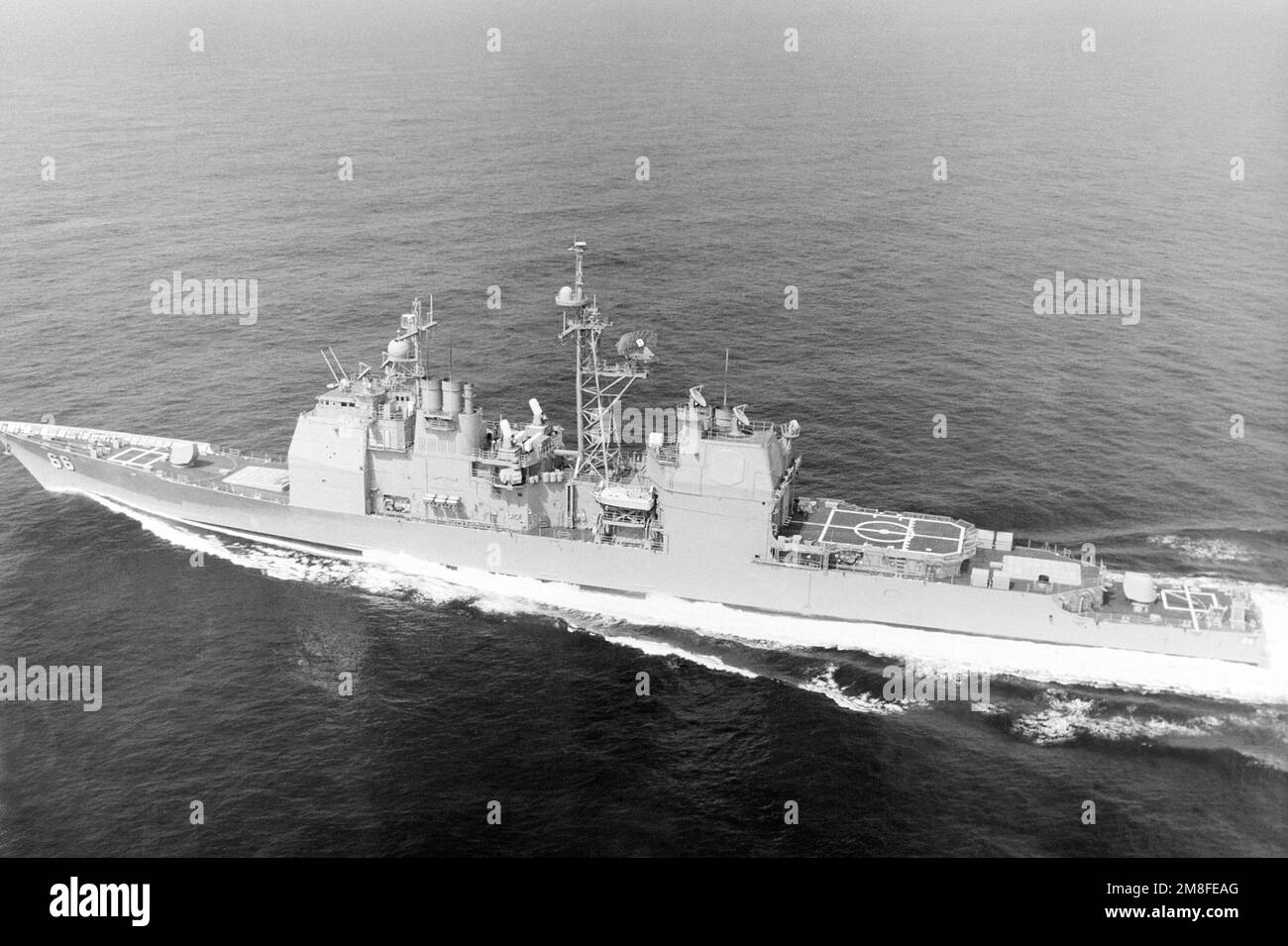 A port beam view of the guided missile cruiser USS HUE CITY (CG 66 ...