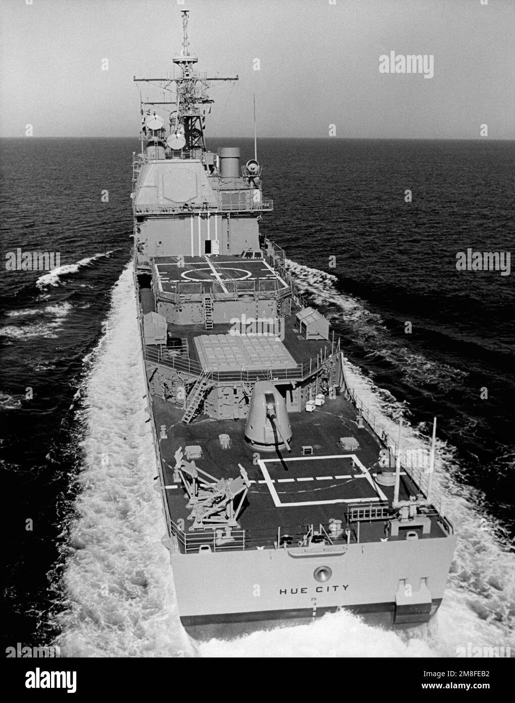 A stern view of the guided missile cruiser HUE CITY (CG-66) underway in ...