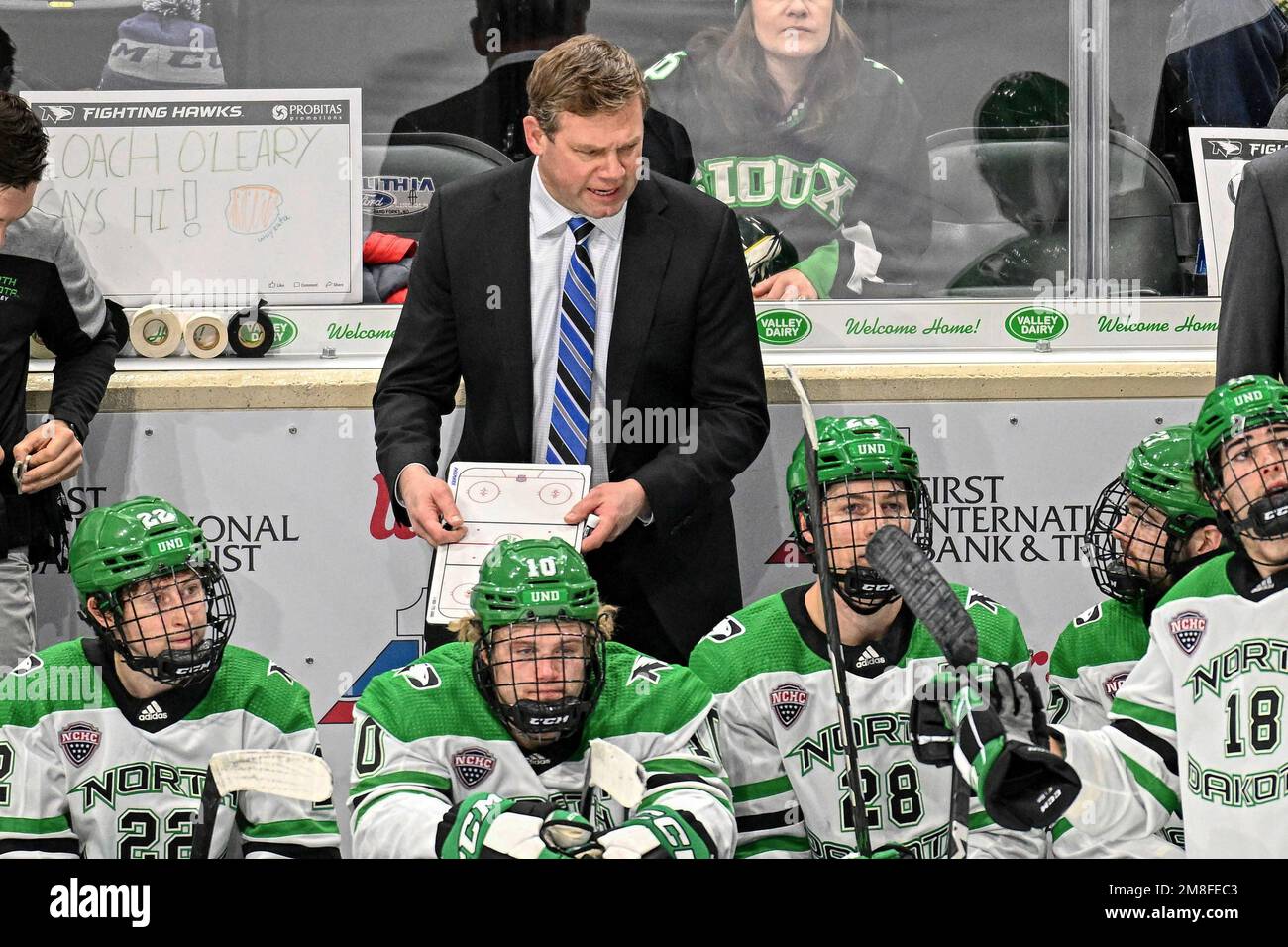 North Dakota assistant head coach Dane Jackson addresses the team ...