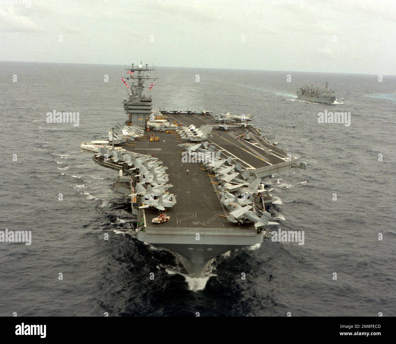 A bow view of the nuclear-powered aircraft carrier USS ABRAHAM LINCOLN ...