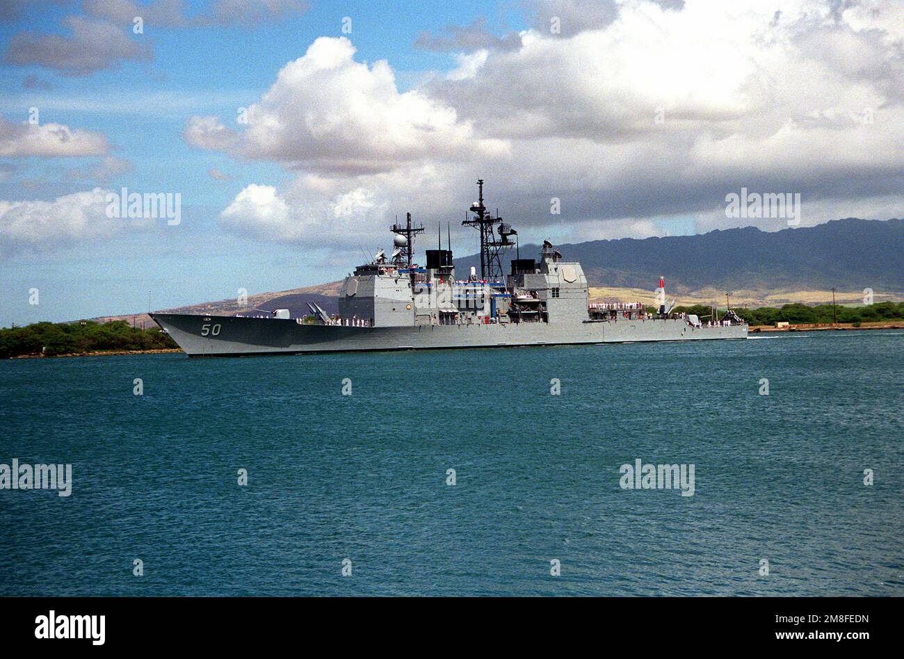 The guided missile cruiser USS VALLEY FORGE (CG-50) departs from the ...