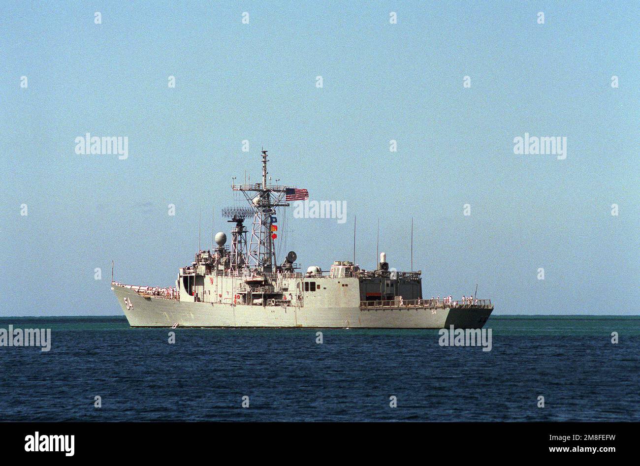 The guided missile frigate USS FORD (FFG-54) heads for the open ocean ...