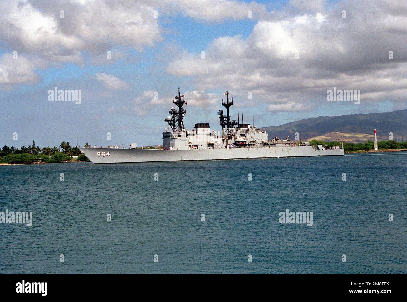 A port view of the destroyer USS PAUL F. FOSTER (DD 964) departing ...