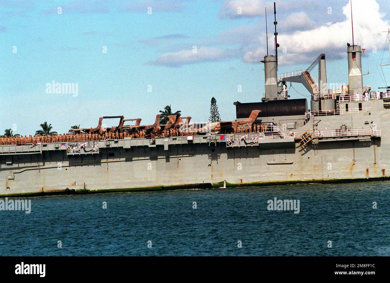 Marines man the rails in front of several Marine Corps OV-10 Bronco ...