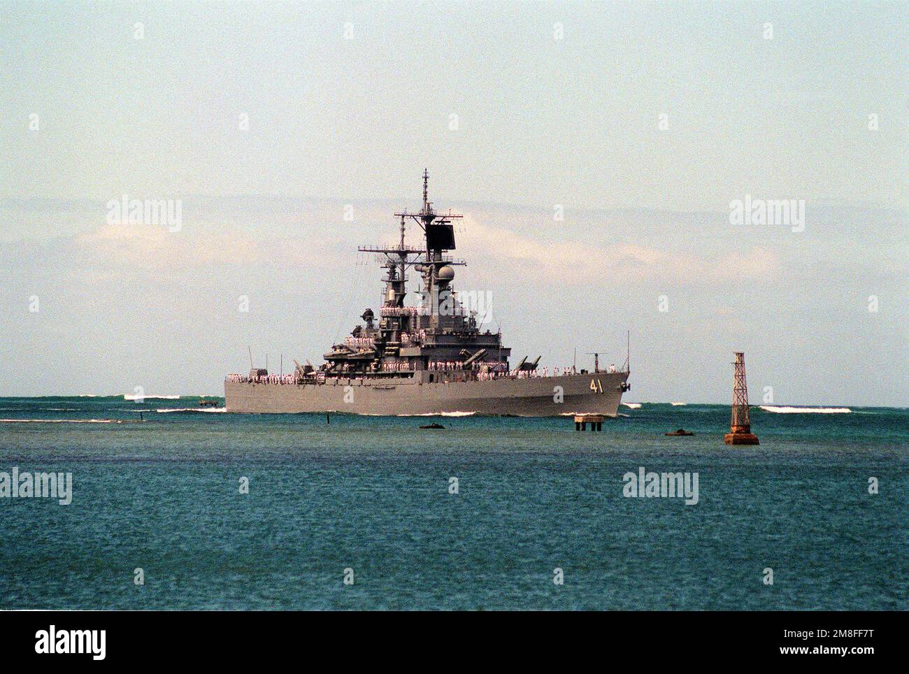 With its crew manning the rails, the nuclear-powered guided missile ...