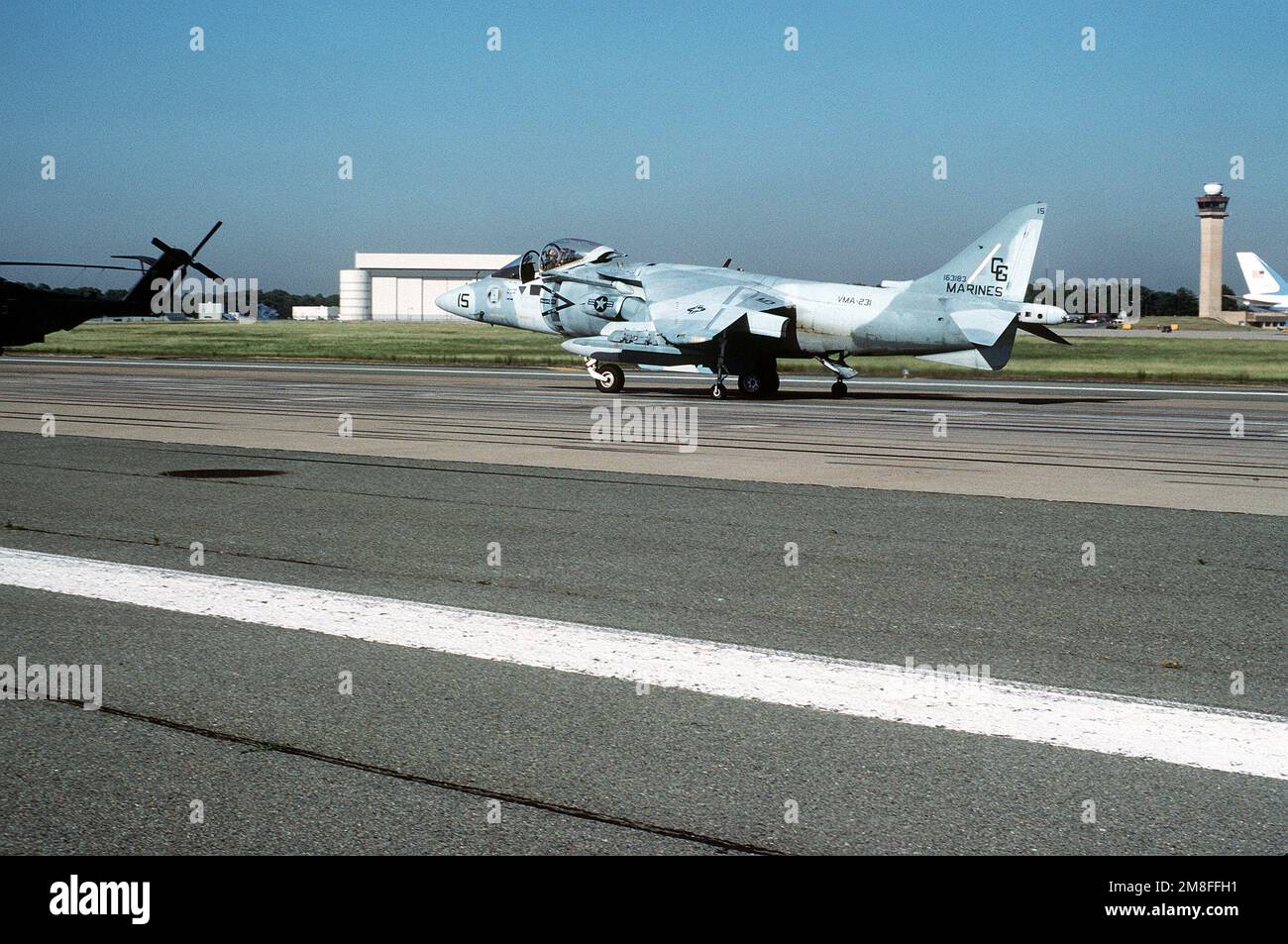 A Marine Attack Squadron 231 (VMA-231) AV-8A Harrier II aircraft stands ...