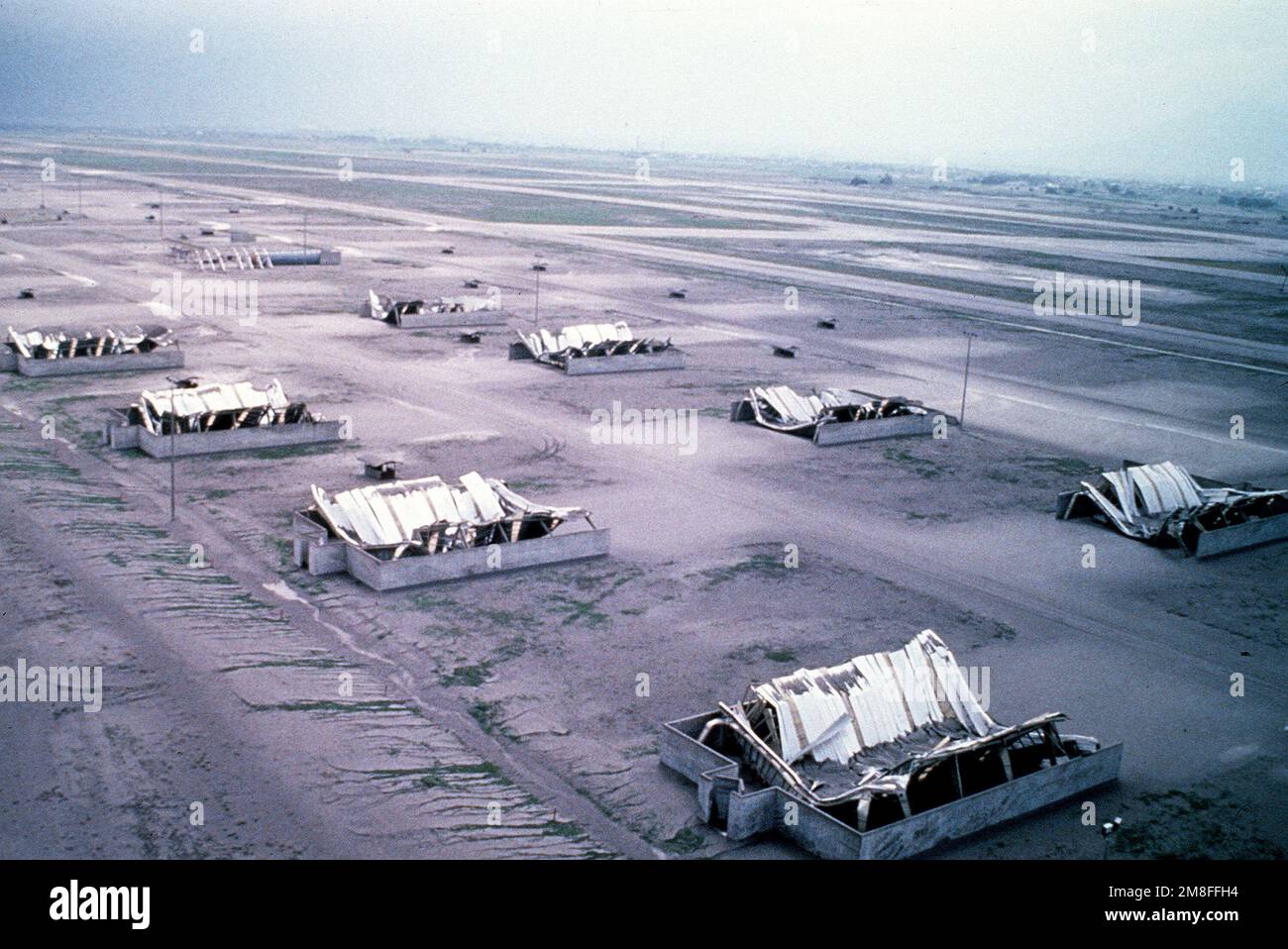 Aircraft weather shelters are collapsed after more than four inches of ...