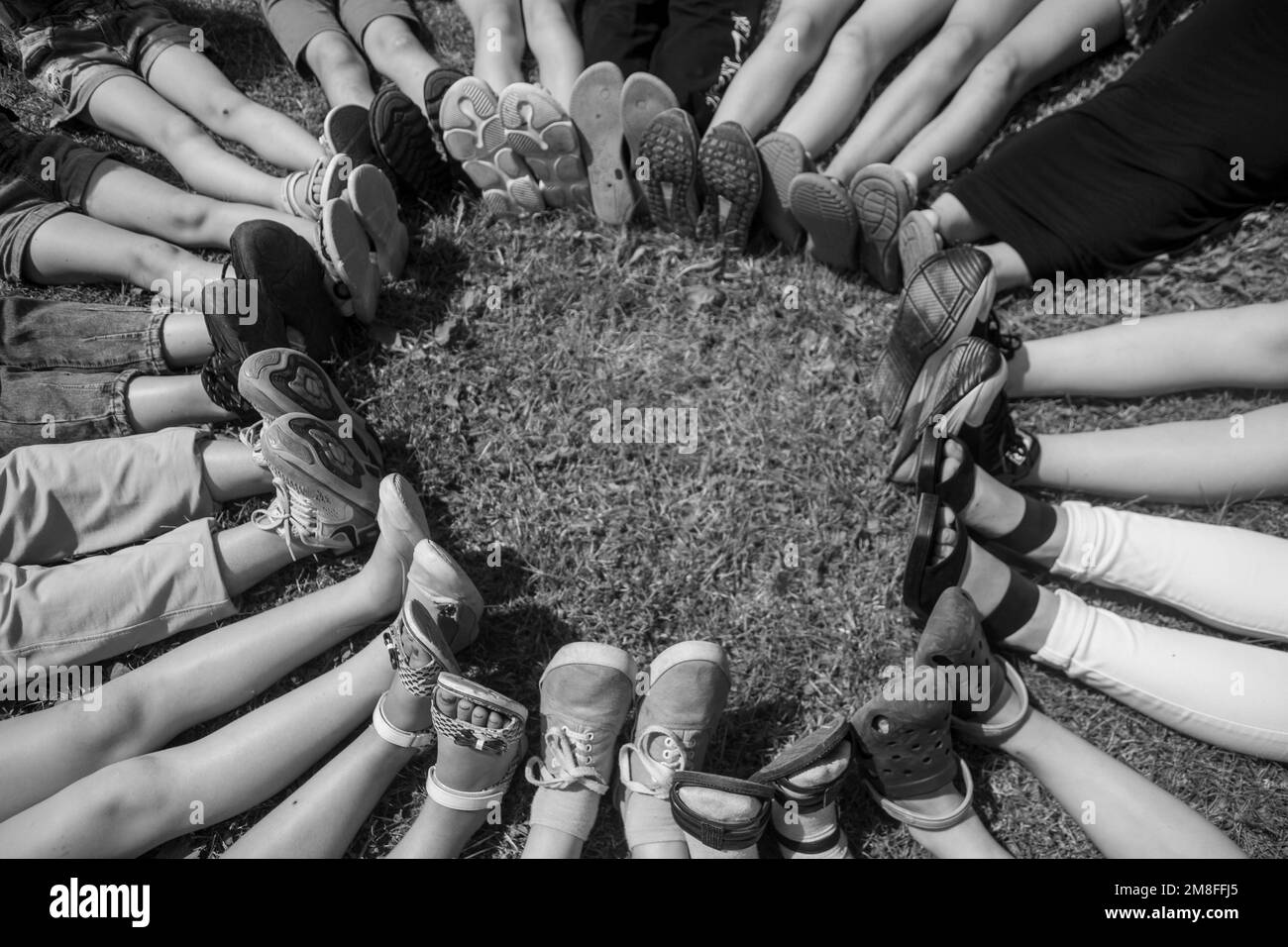 Feet in a circle Black and White Stock Photos & Images - Alamy