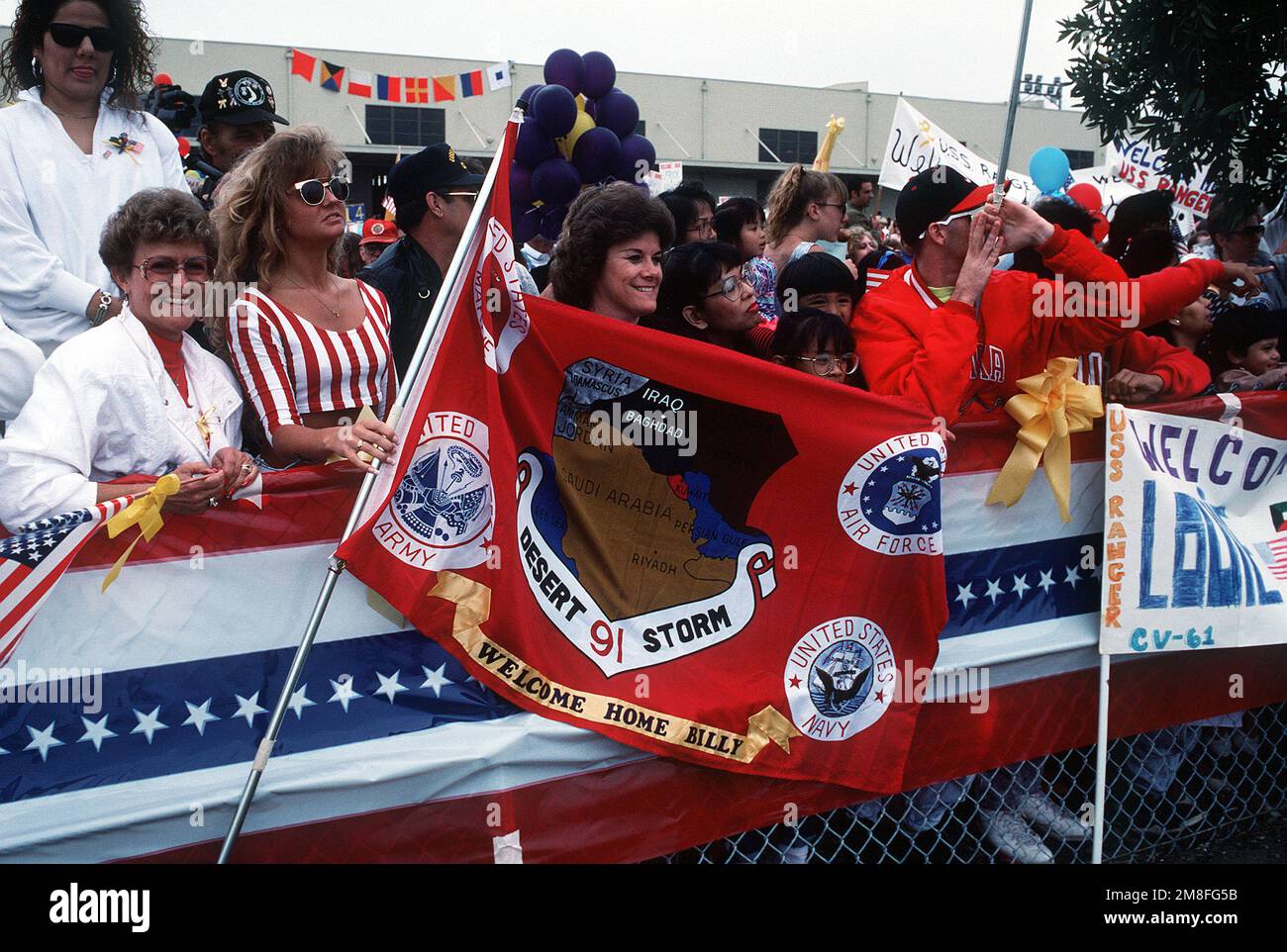 Family and friends of crew members aboard the aircraft carrier USS ...