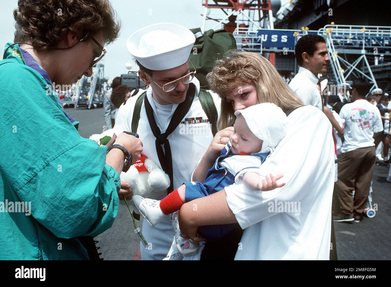 A sailor assigned to the aircraft carrier USS RANGER (CV-61) is ...