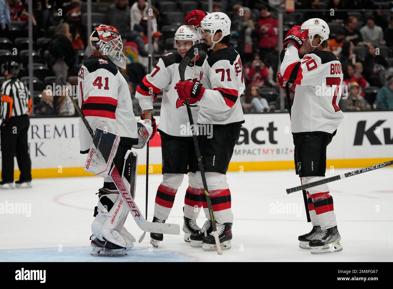 The New Jersey Devils celebrate after a 6-2 win over the Anaheim Ducks ...