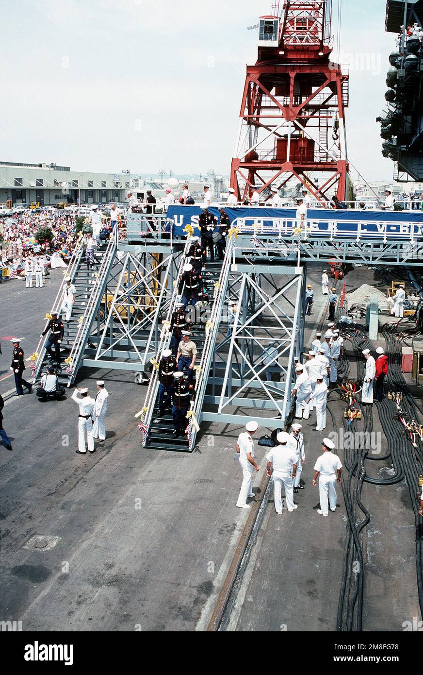 Members of the Marine detachment aboard the aircraft carrier USS RANGER ...