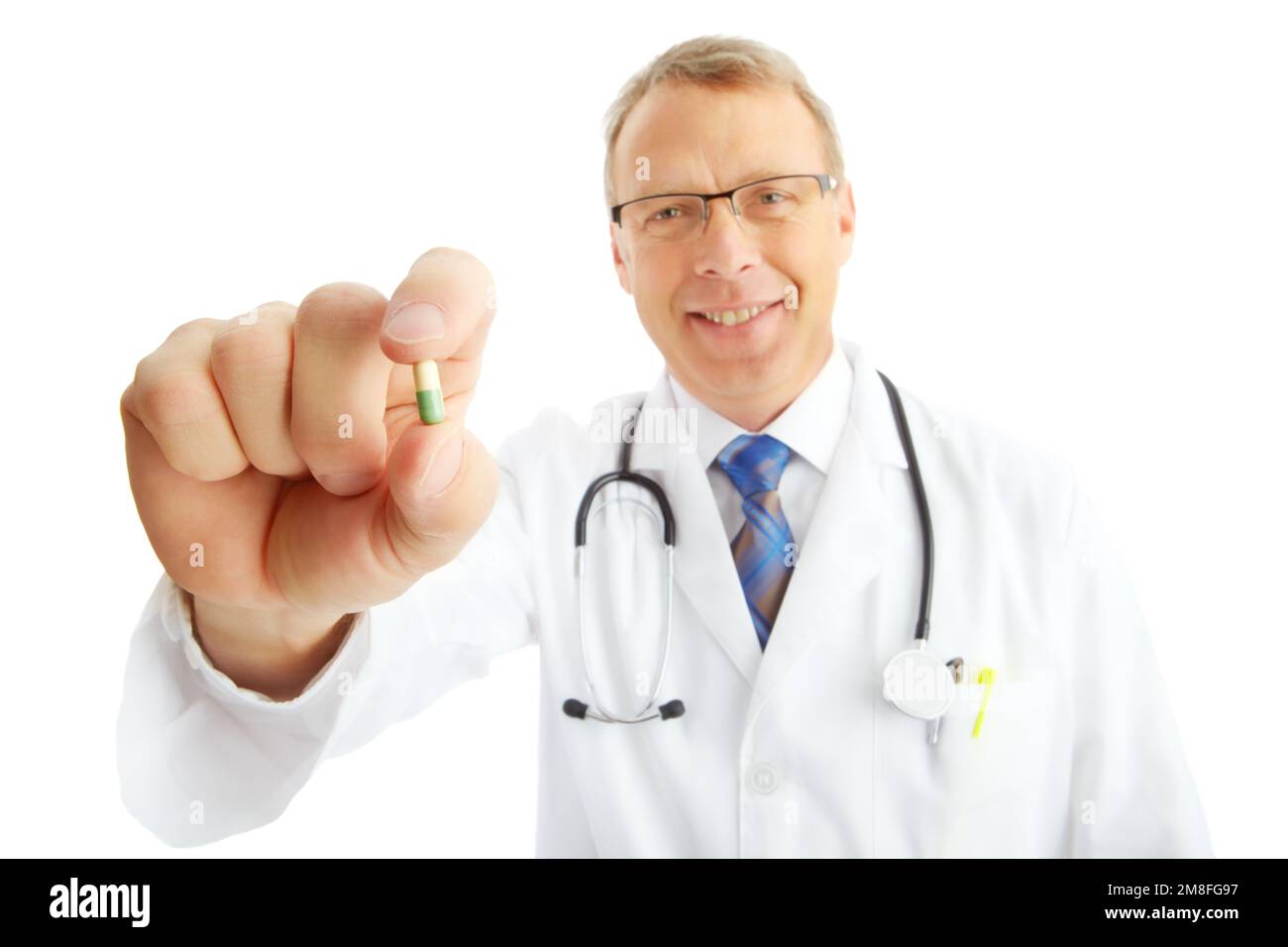 Face, doctor and man with pills in studio isolated on a white ...