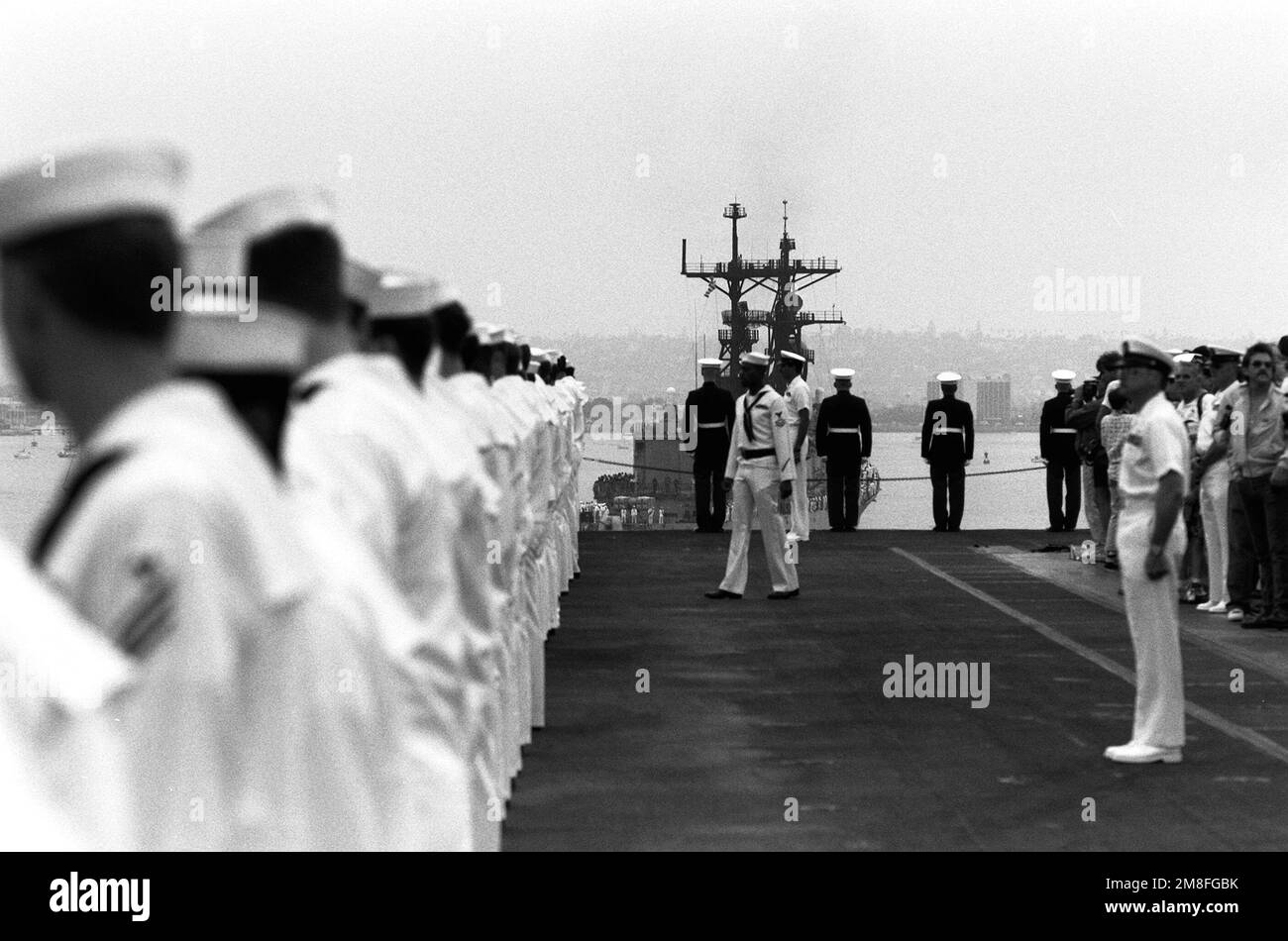 Crew members man the rails aboard the aircraft carrier USS RANGER (CV ...