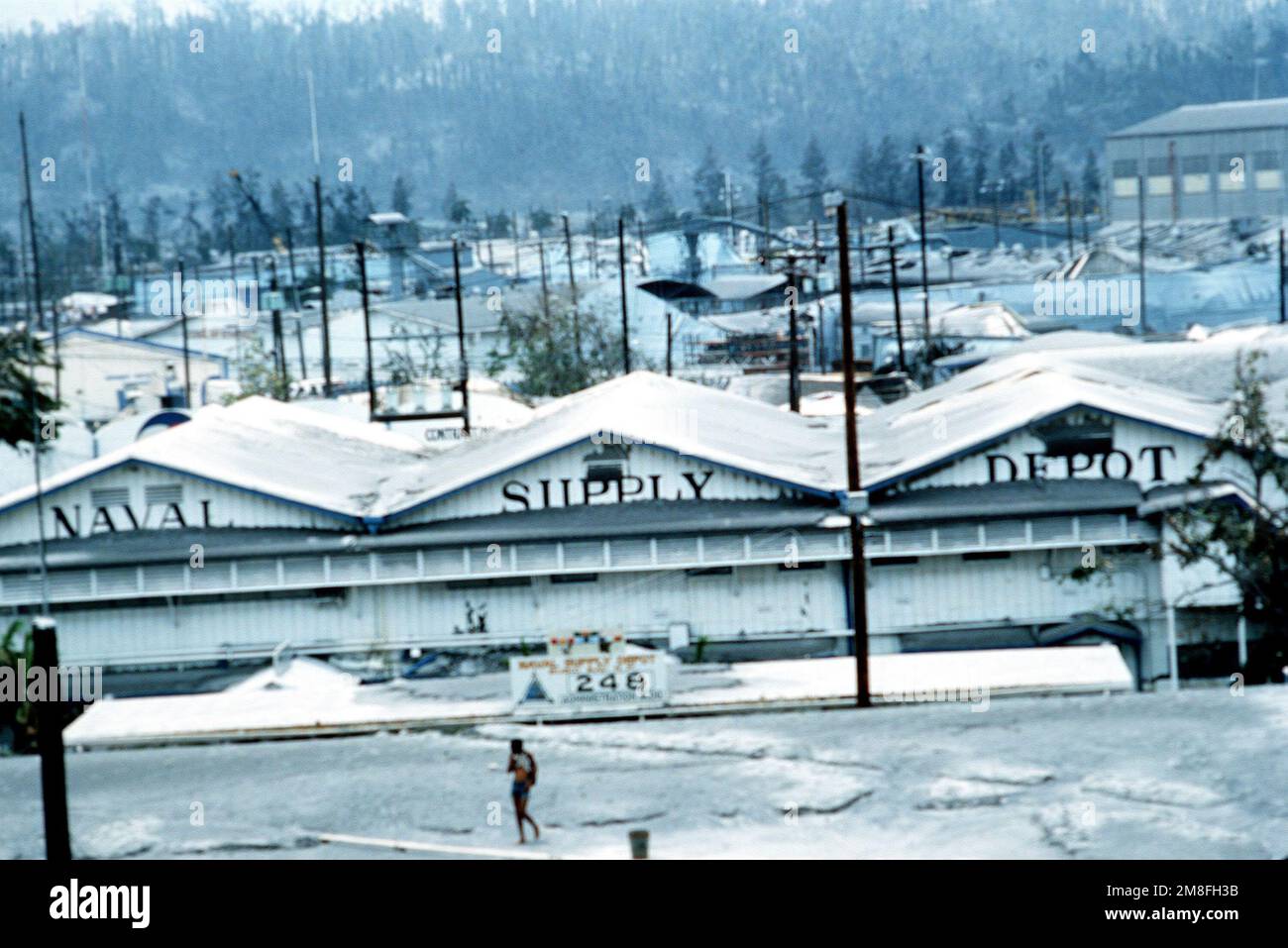 A blanket of ash covers the supply depot and surrounding area in the ...