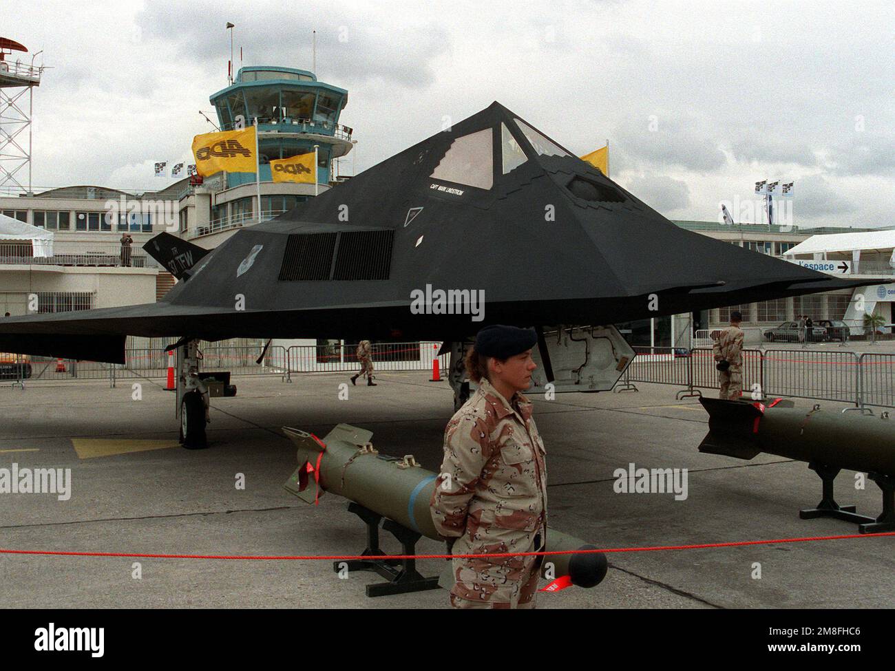 U.S. Air Force security police stand at parade rest around a 37th ...