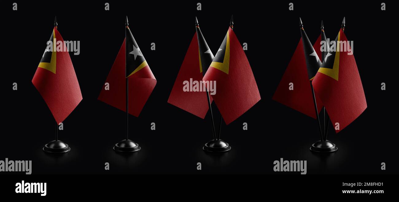 Small national flags of the East Timor on a black background Stock ...