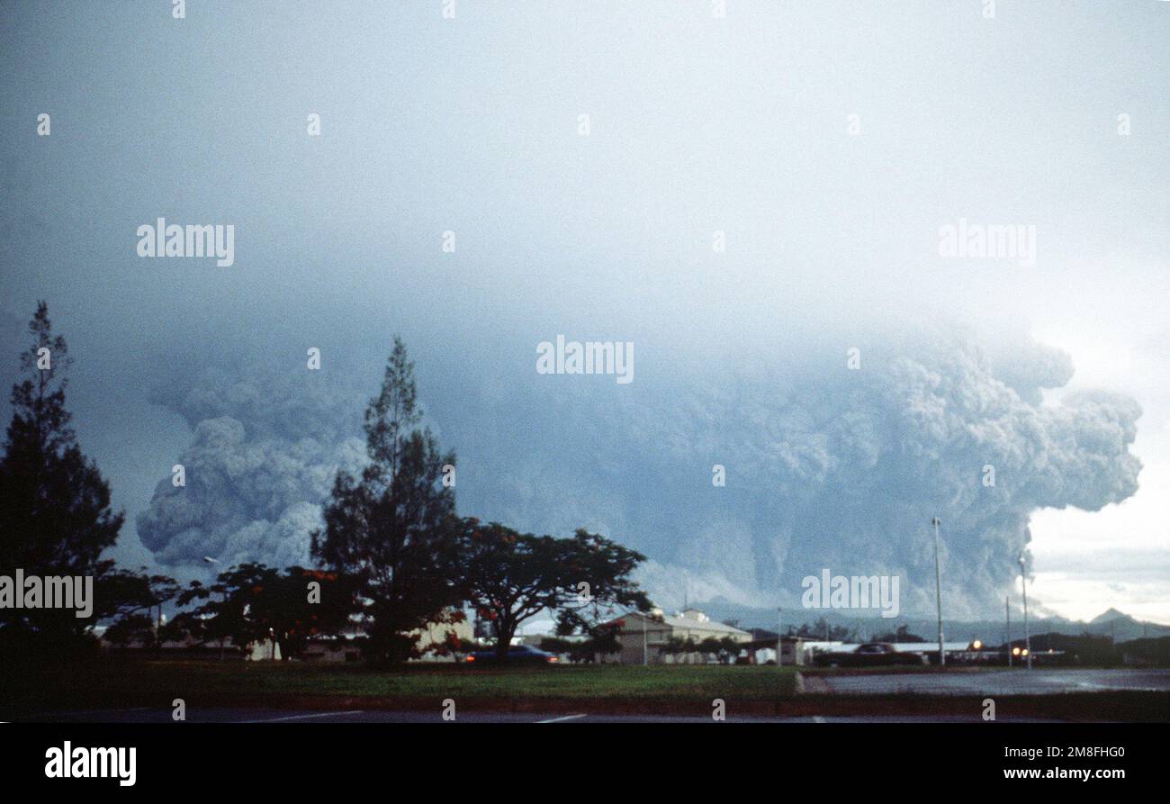 Clouds of ash pour from Mount Pinatubo as the volcano erupts for the ...