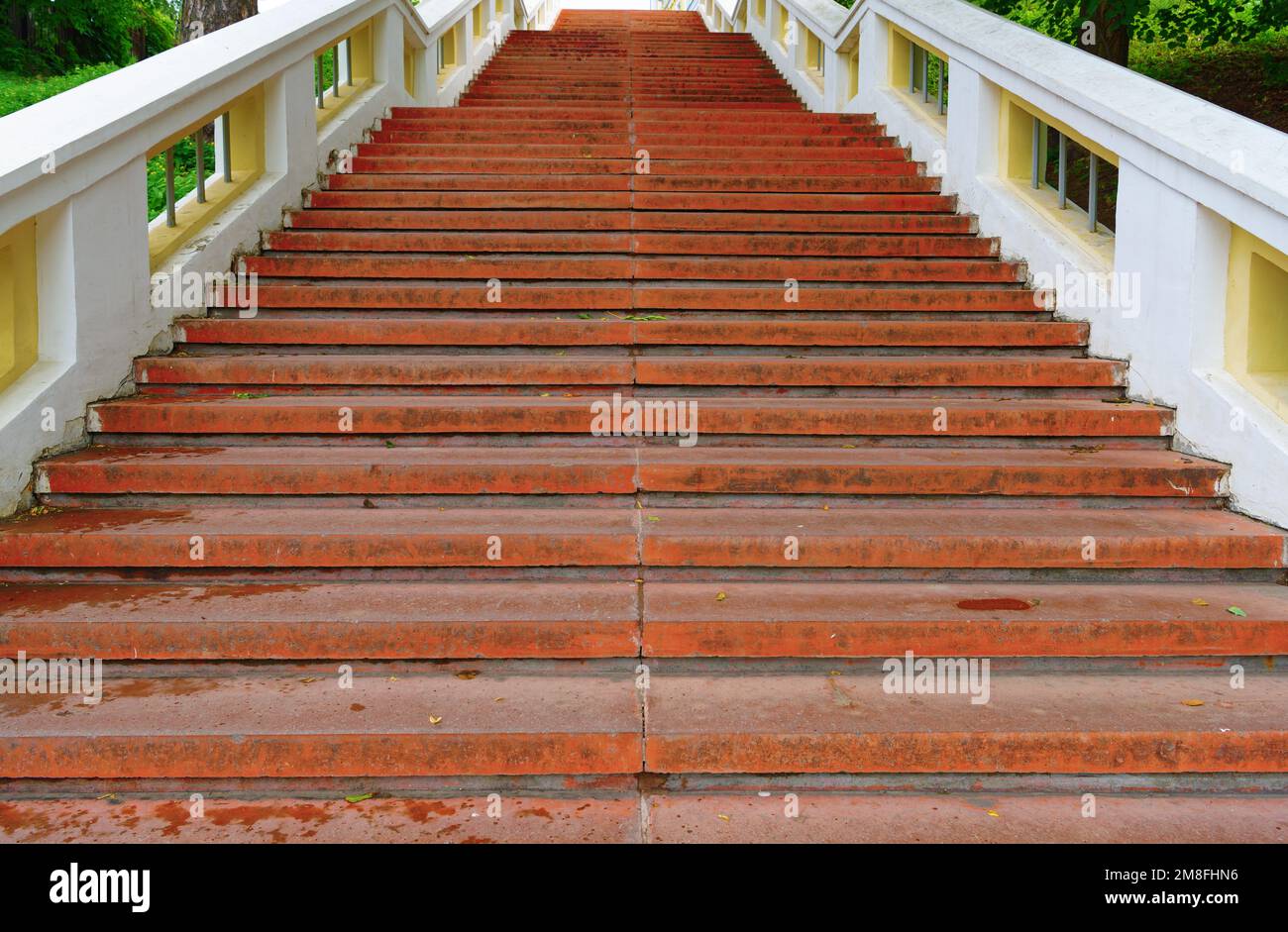 Old red stone staircase up to the top Stock Photo - Alamy
