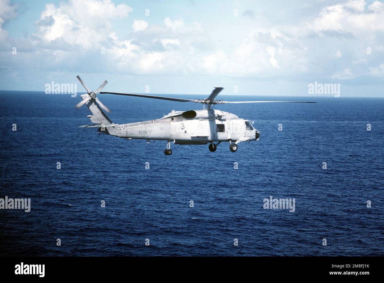 An SH-60F Sea Hawk helicopter of Helicopter Combat Support Squadron 6 ...